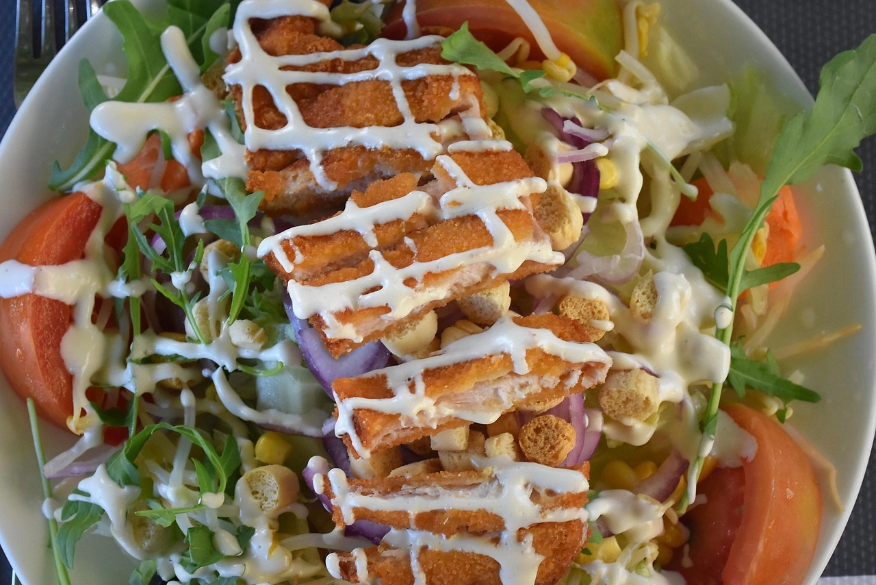 Costco Recalls Caesar Salad and Chicken Sandwich Over Plastic in Dressing