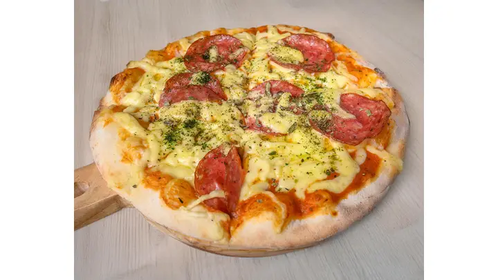 Domino's Pizza Stock Underperforms Market in 2025
